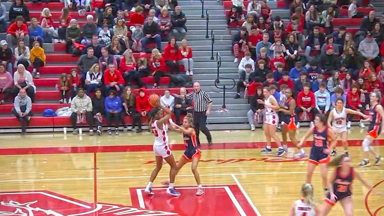 Trinity Jones threading the needle