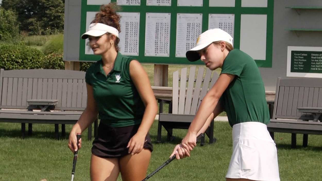 Waubonsie Valley and Naperville Central girls golf tee it up at Naperbrook