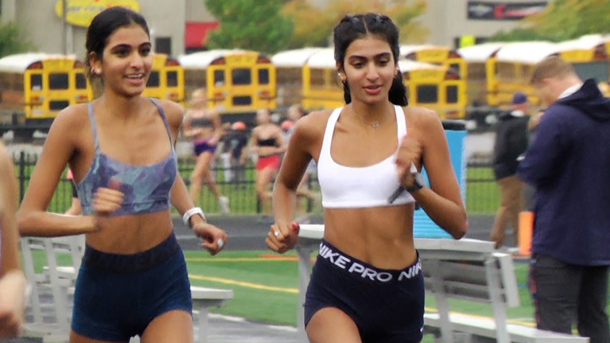 The Tandon twins keep Naperville North cross country in stride