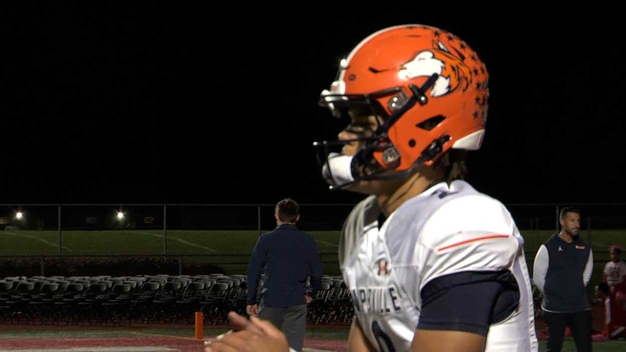 Bell rings for nine: Naperville North football wins overtime shootout ...