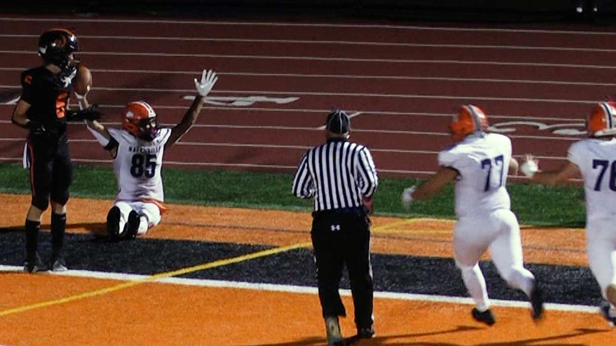 Quinn Morris lays out for an amazing touchdown to help Naperville North ...